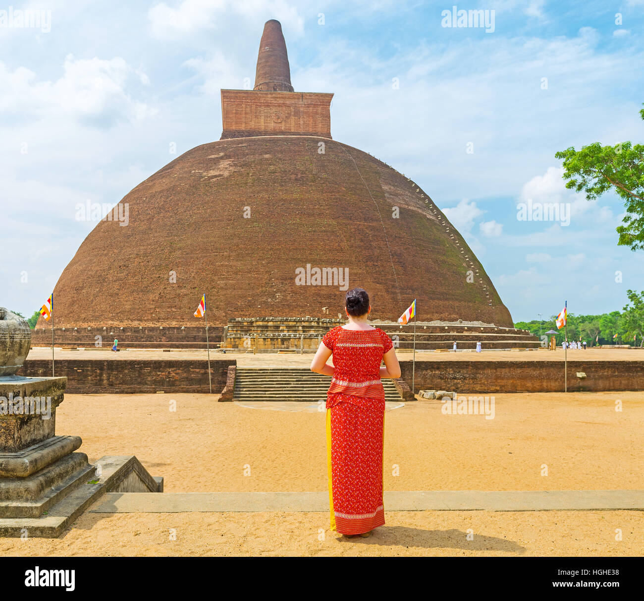 The tourist watches the giant Abhayagiri Stupa, one of the famous ...