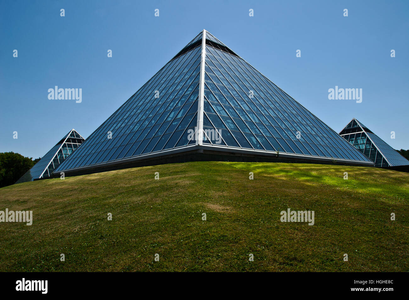 This image shows the Muttart Conservatory, an enclosed botanical garden ...