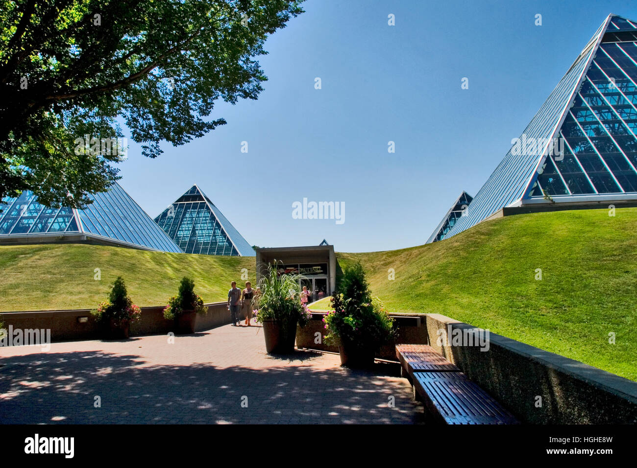 This image shows the Muttart Conservatory, an enclosed botanical garden ...