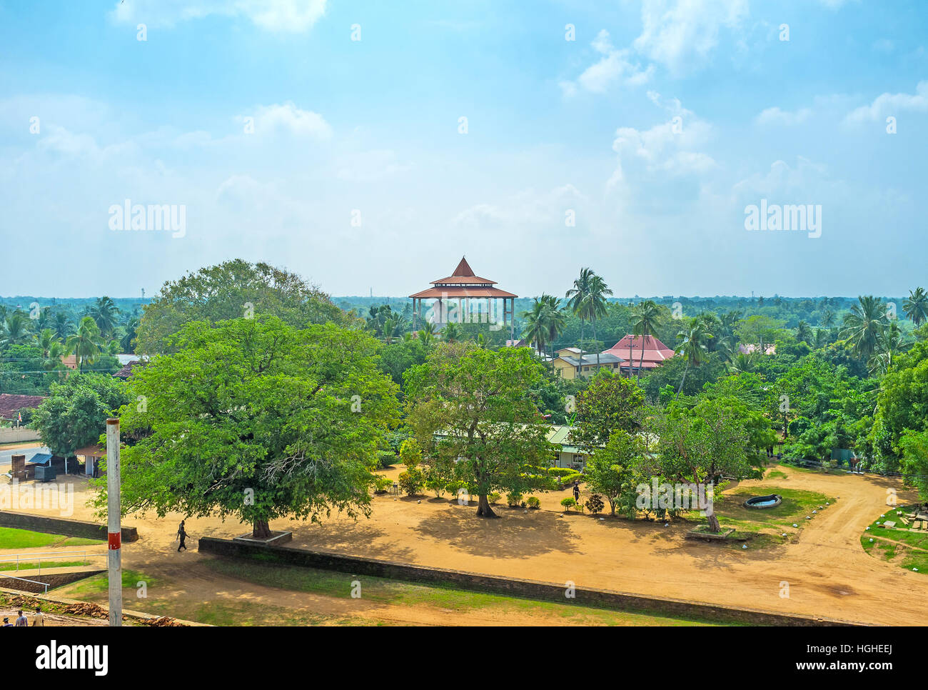 The top of Triumphant Stupa overlooks the lush jungle gardens of ...