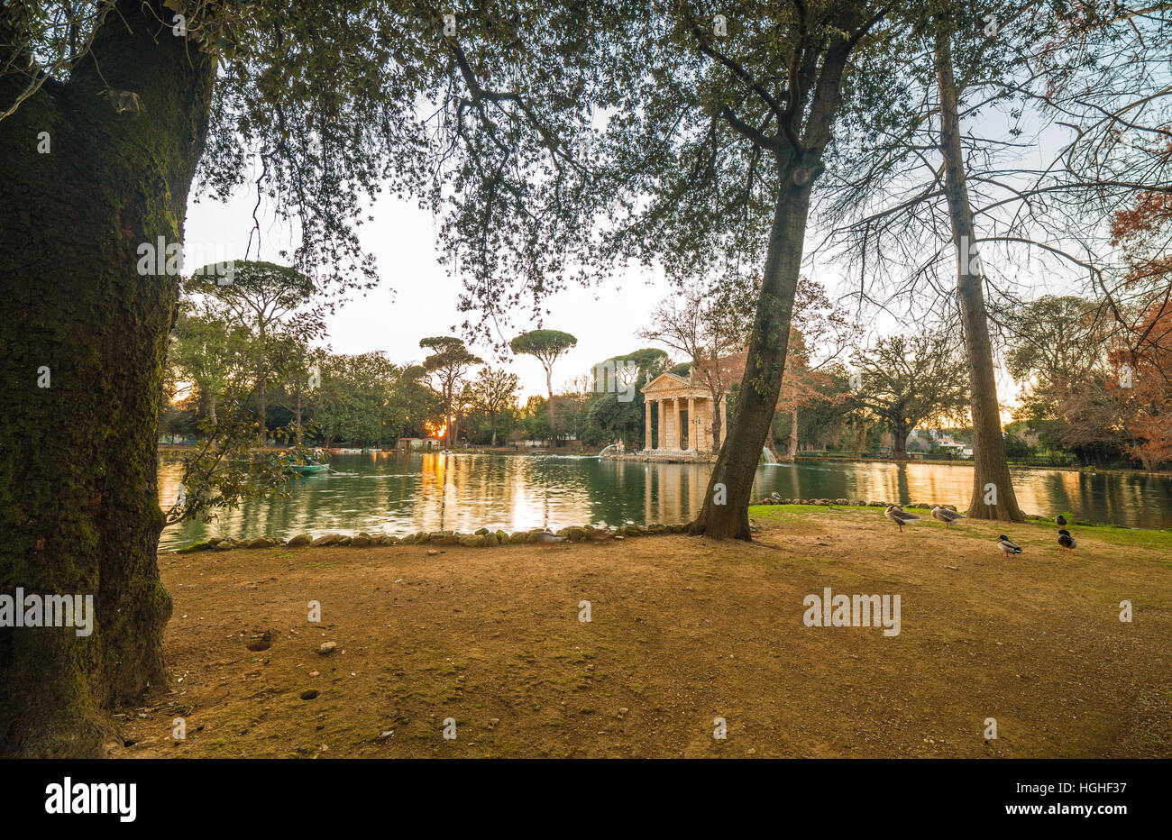 idyllic lake with romantic building in an English Landcsape garden in ...