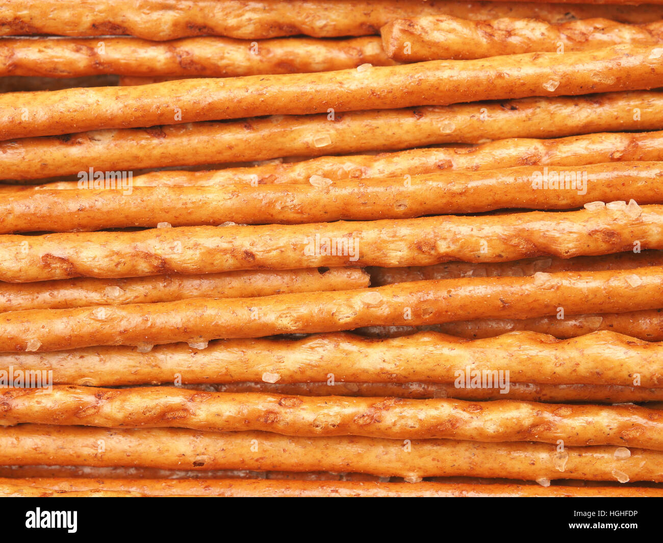 Salted sticks background, fast food texture concept Stock Photo - Alamy