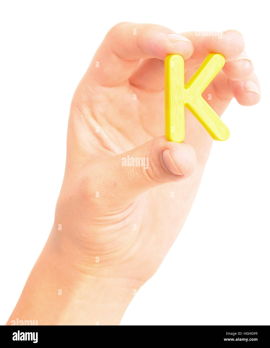 the letter K in a hand isolated on white background Stock Photo - Alamy