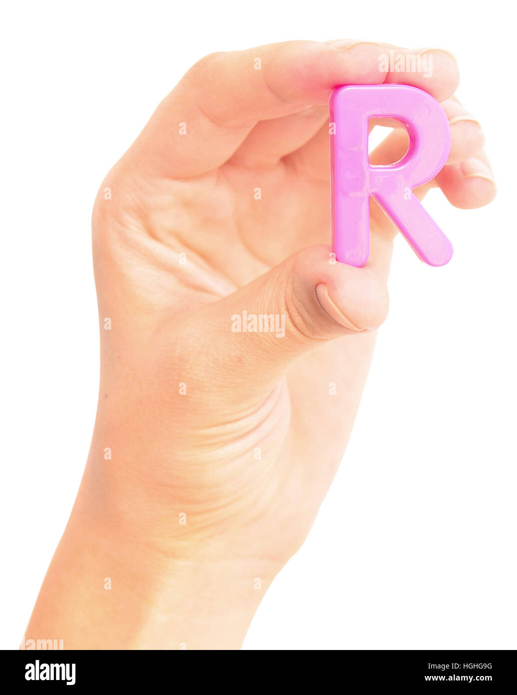 the letter R in a hand isolated on white background Stock Photo - Alamy