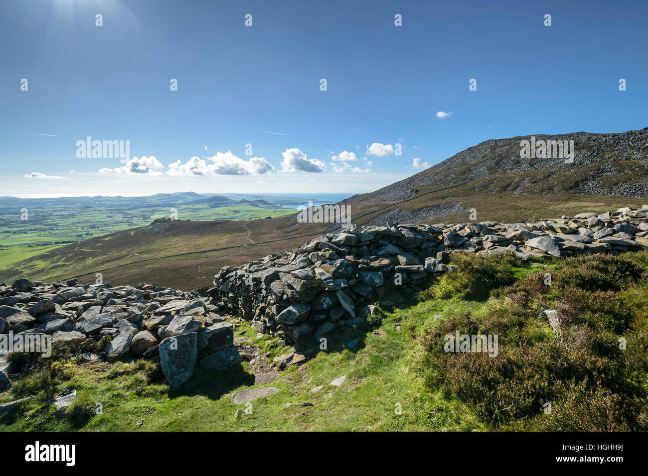 Tre'r Ceiri Ancient Iron age Hill fort from the Llyn coastal path ...