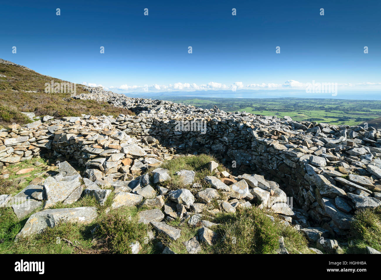Tre'r Ceiri Ancient Iron age Hill fort from the Llyn coastal path ...
