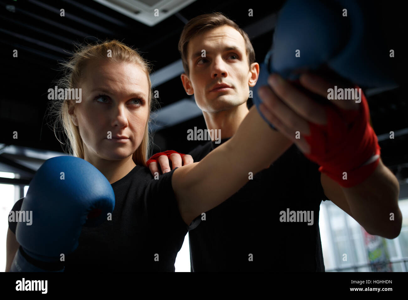 Training of girl with coach Stock Photo - Alamy