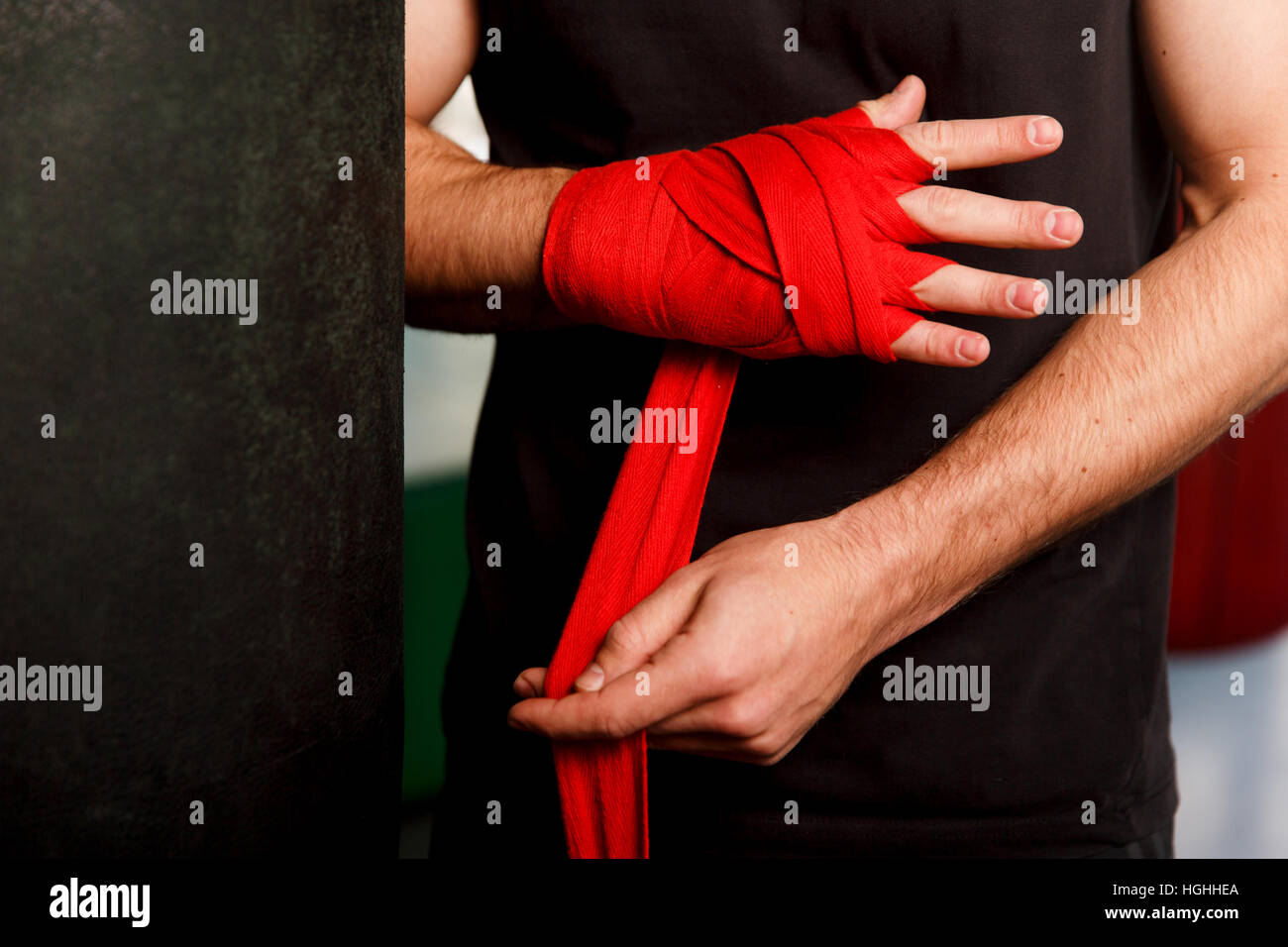 Man wears red boxing bandages Stock Photo - Alamy