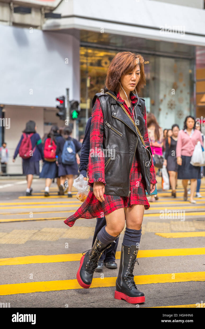 Asian woman walking Stock Photo - Alamy