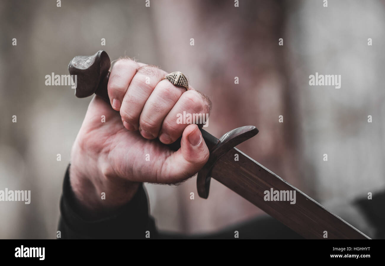 Hand sword symbol hi-res stock photography and images - Alamy