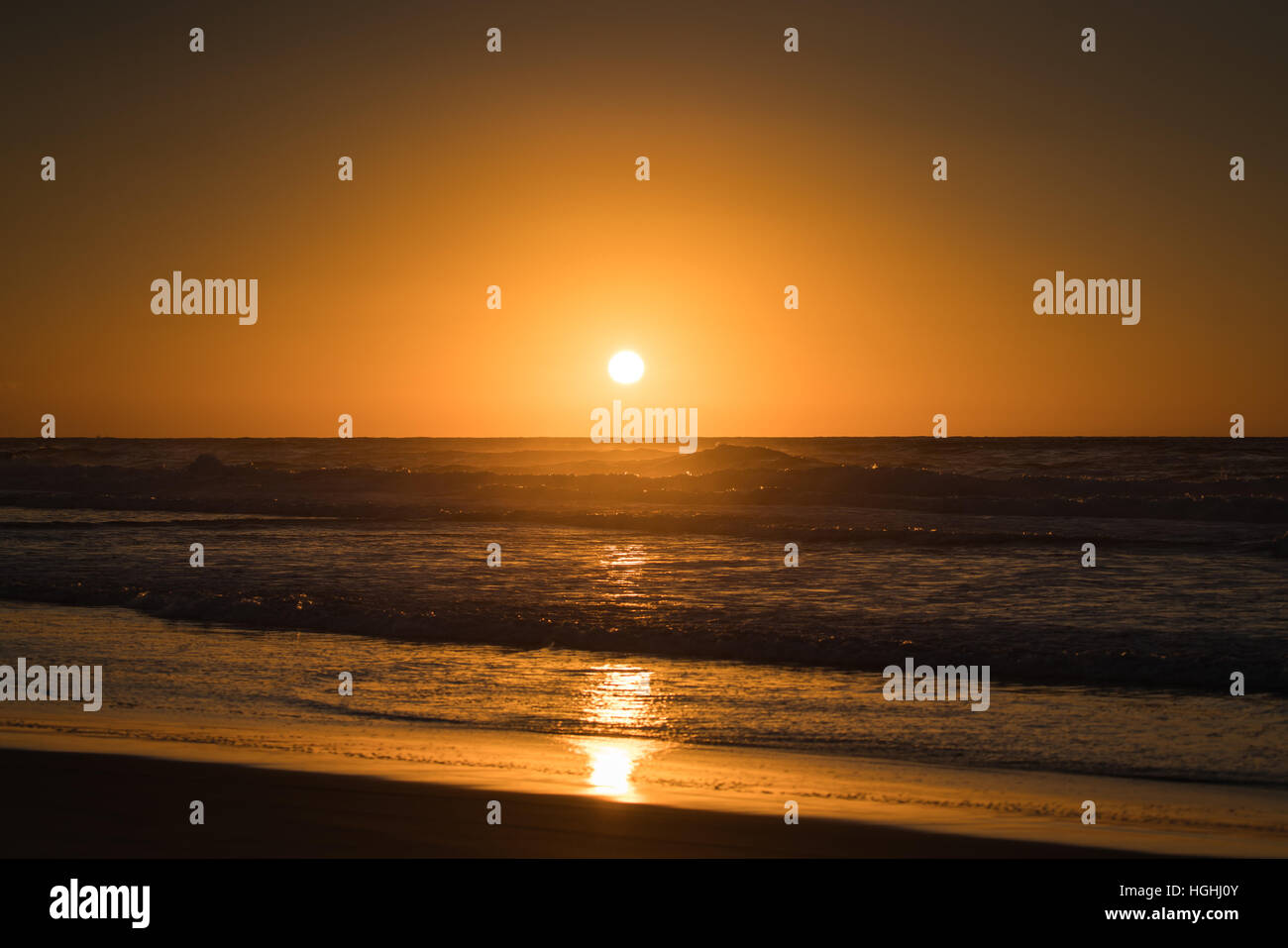 the landscape sea waves on sunset background Stock Photo - Alamy