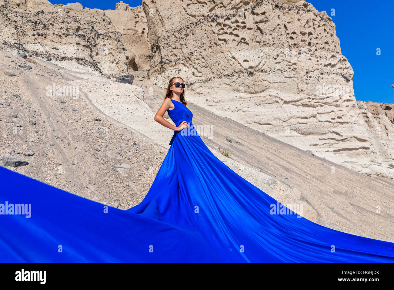 Woman in blue dress outdoors hi-res stock photography and images - Alamy