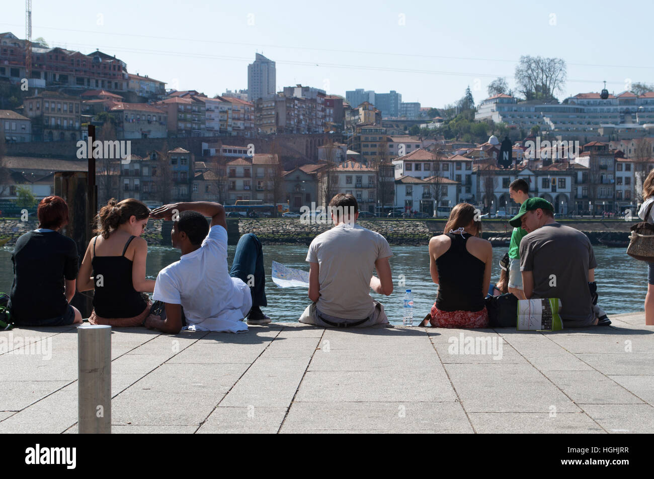 Porto, Portugal, Europe: people chilling in front the skyline of Vila ...