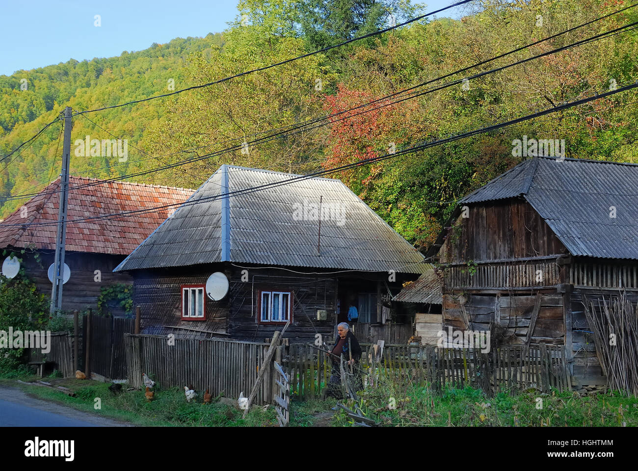 Maramures, an isolated Carpathian region of Romania. An old woman and ...