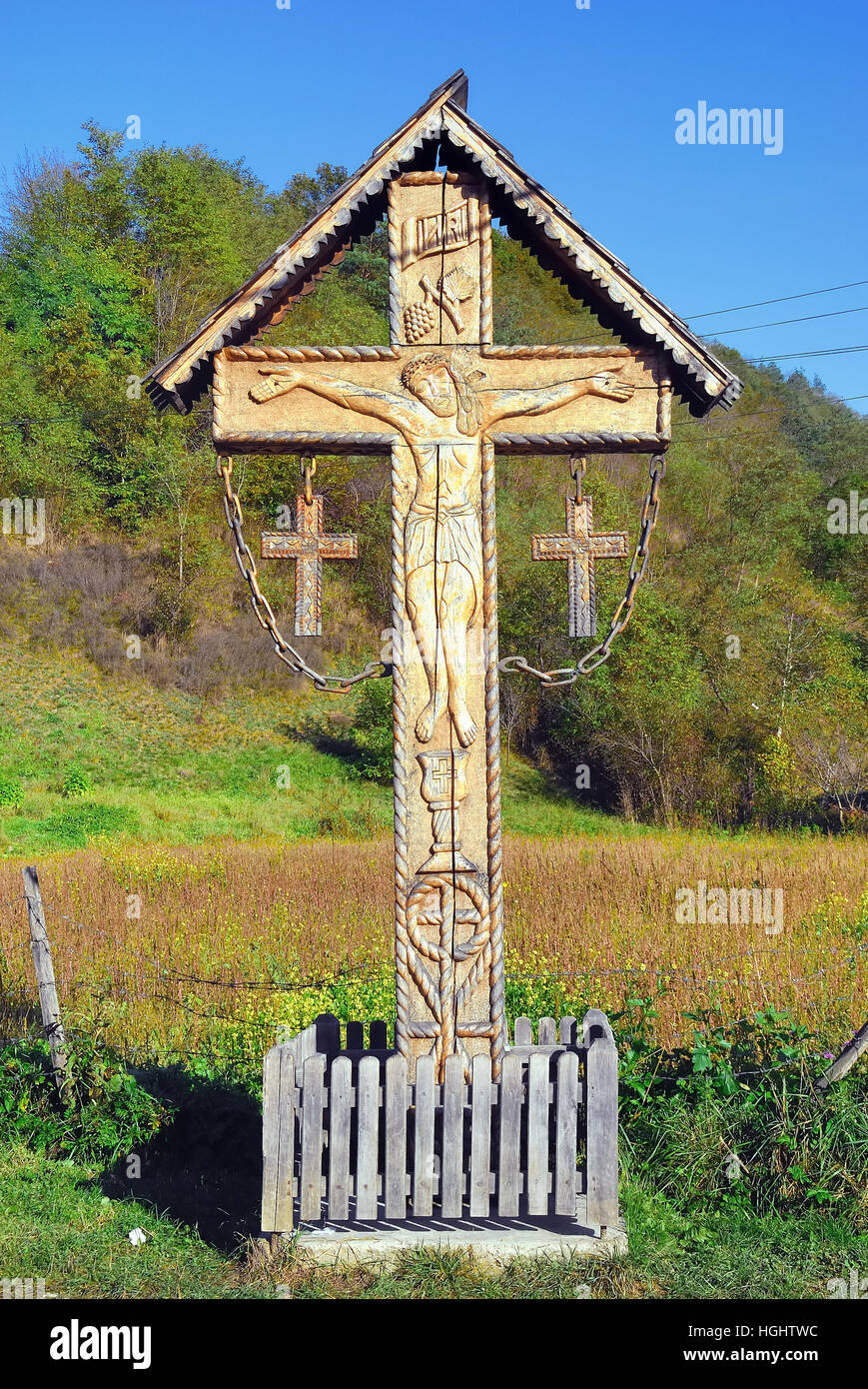 Maramures, an isolated Carpathian region of Romania. A wooden cross in ...