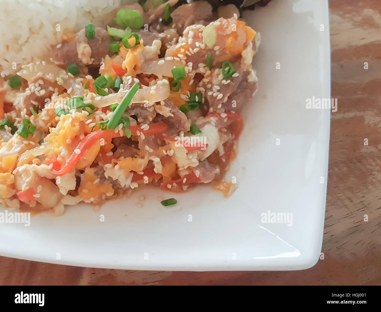 Close-up,Thai food style:"Kaow Moo Tun Pad Thai"fied pork,egg and ...