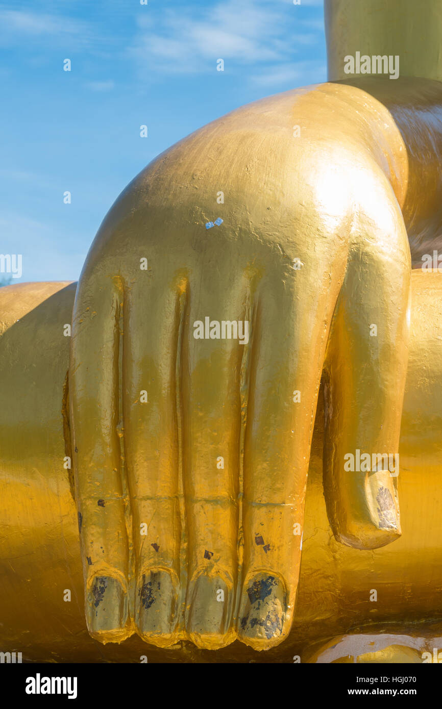 Giant finger of golden buddha statue Stock Photo - Alamy