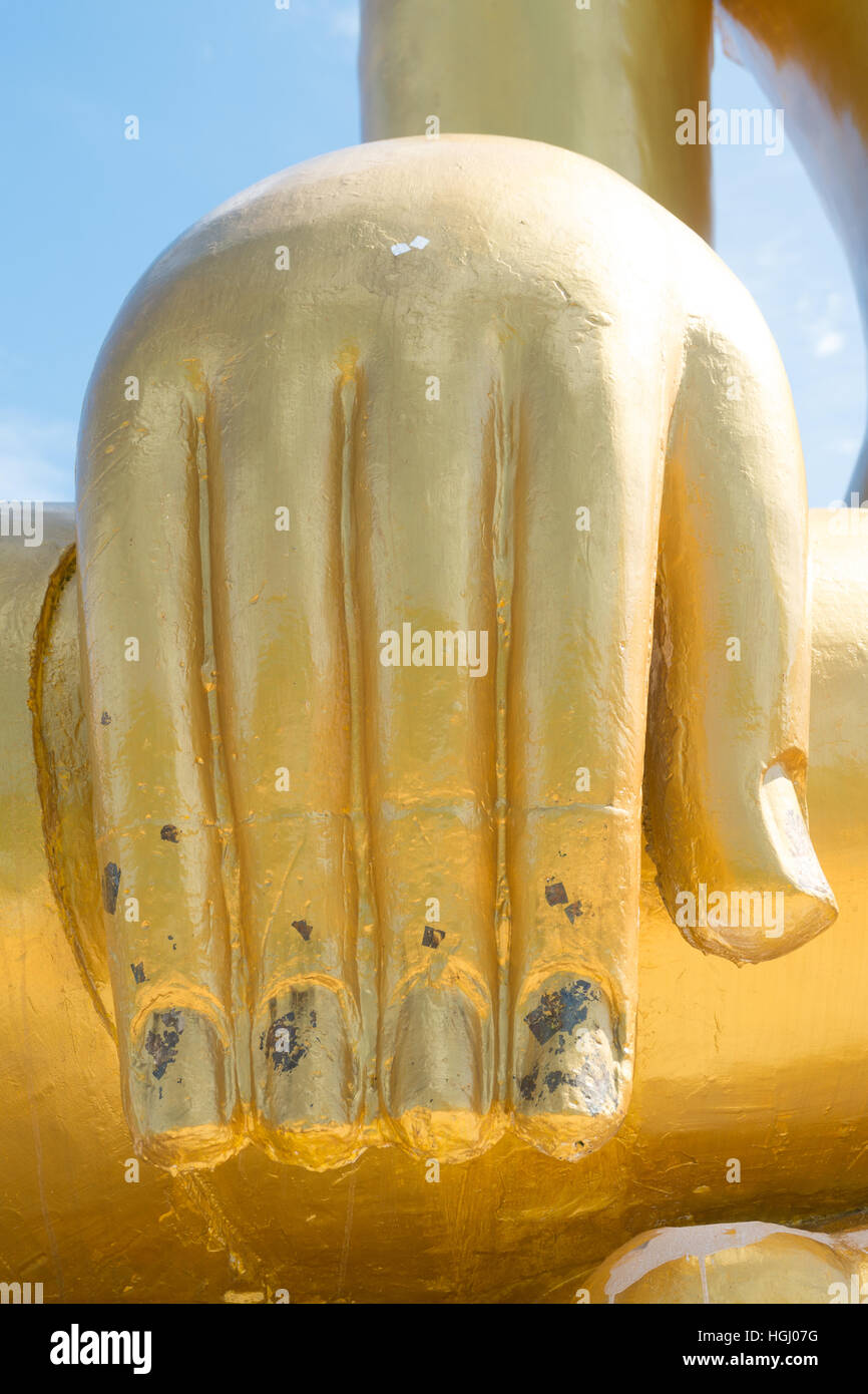 Giant finger of golden buddha statue Stock Photo - Alamy