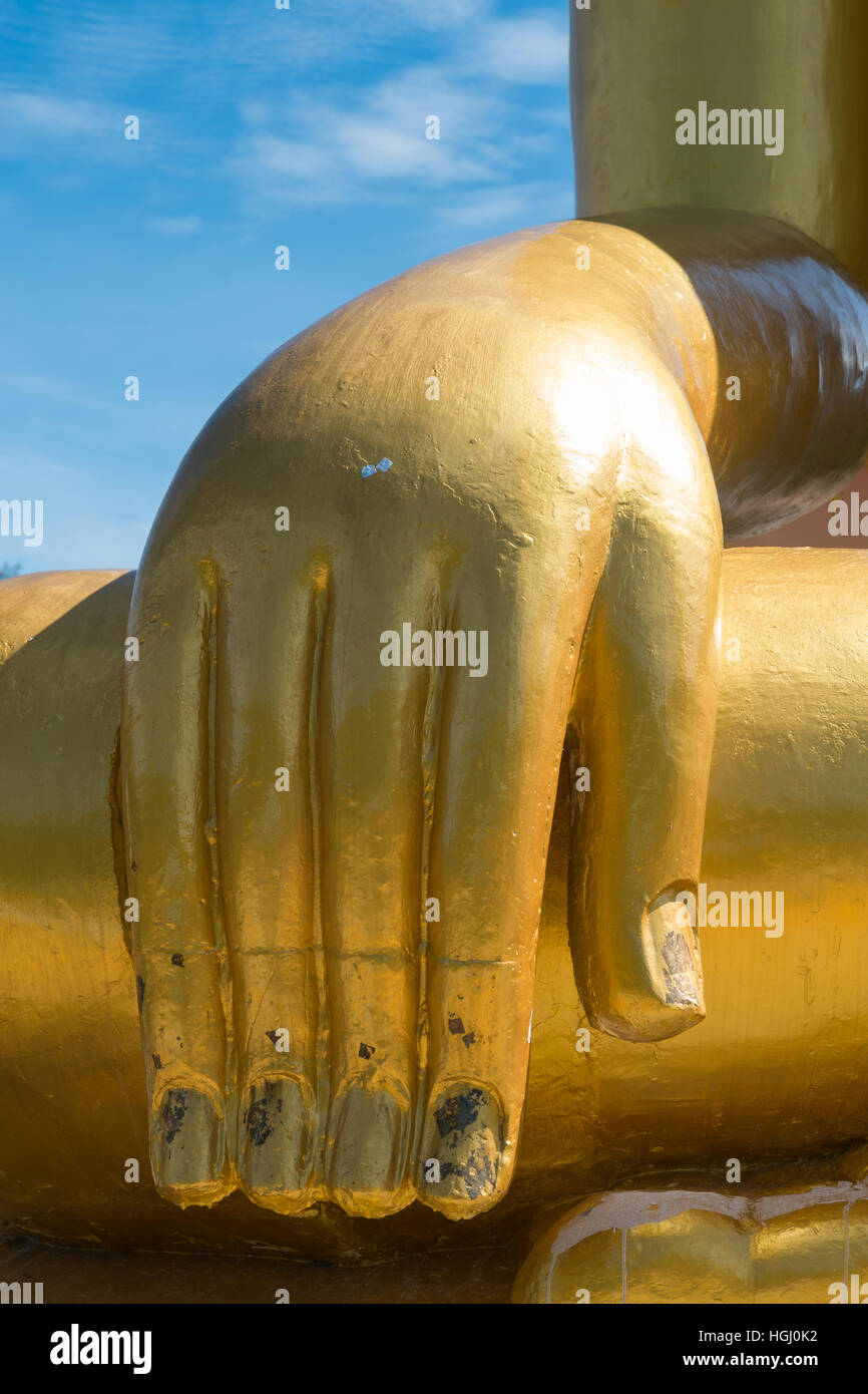Giant finger of golden buddha statue Stock Photo - Alamy