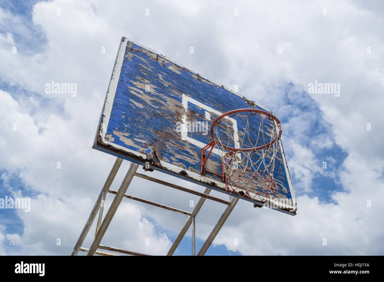Old Basketball Hoop with Blue Sky Stock Photo - Alamy