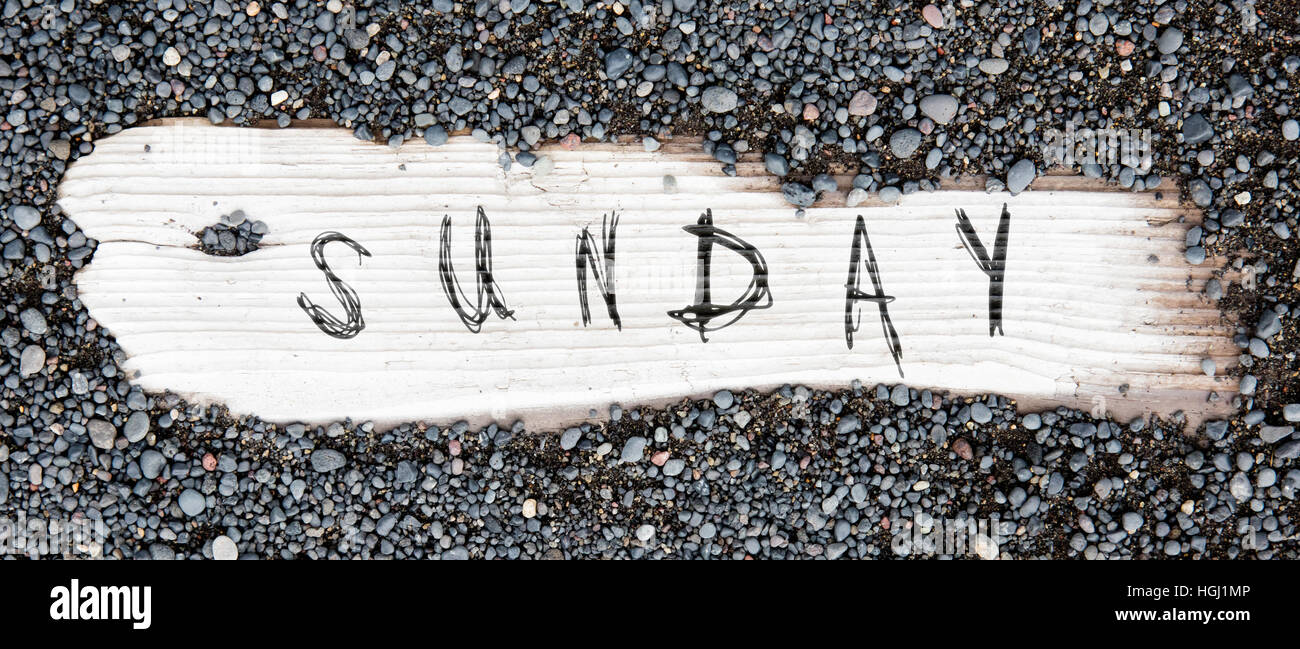 Sand on planked wood, black Icelandic sand - Sunday Stock Photo - Alamy