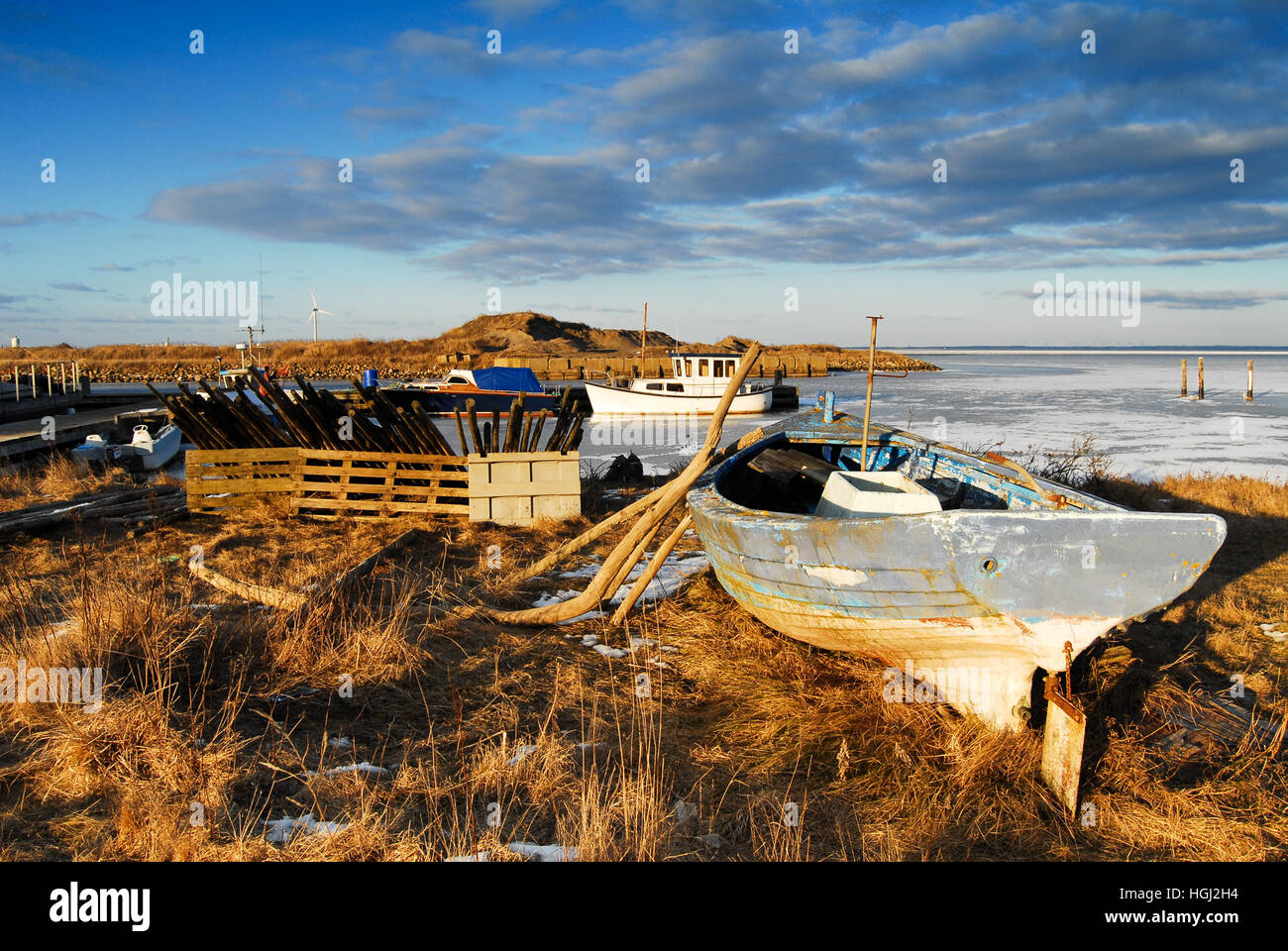 Natural Harbor with boats in the winter with frozen water Stock Photo ...