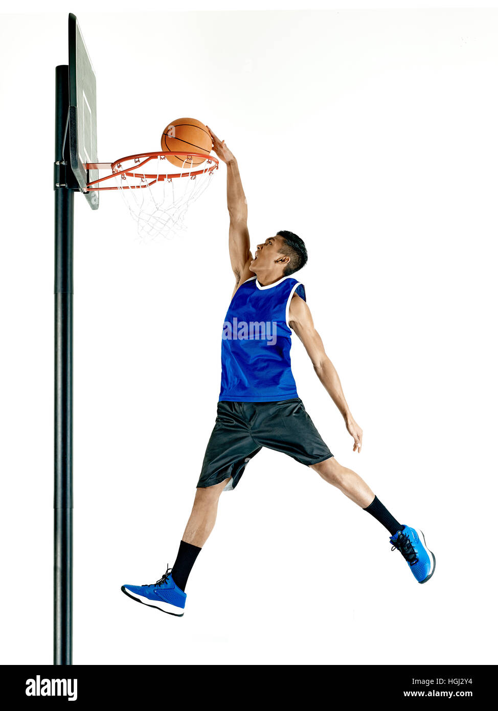 one basketball player man Isolated on white background Stock Photo - Alamy