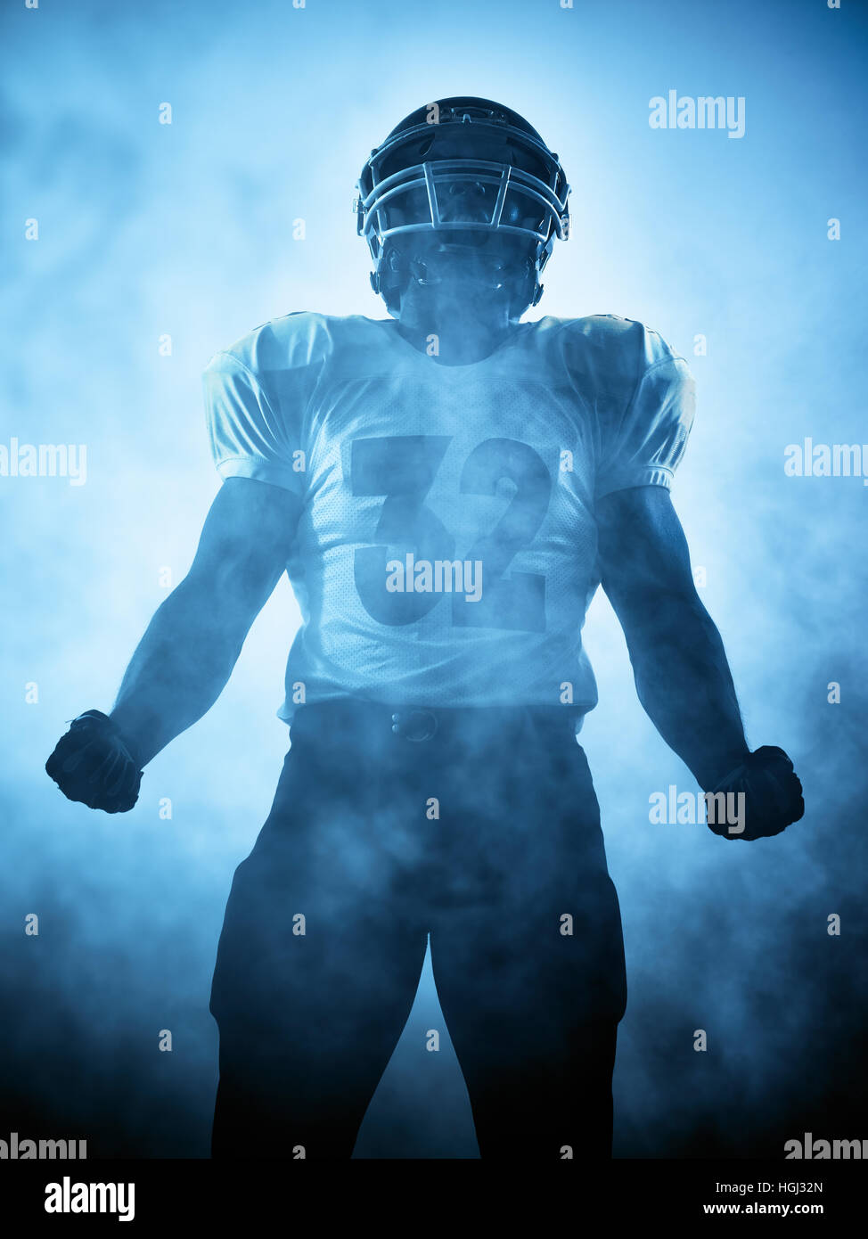 one american football player portrait in silhouette shadow on white ...