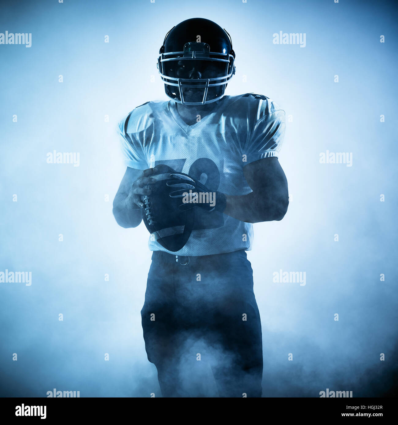 one american football player portrait in silhouette shadow on white ...