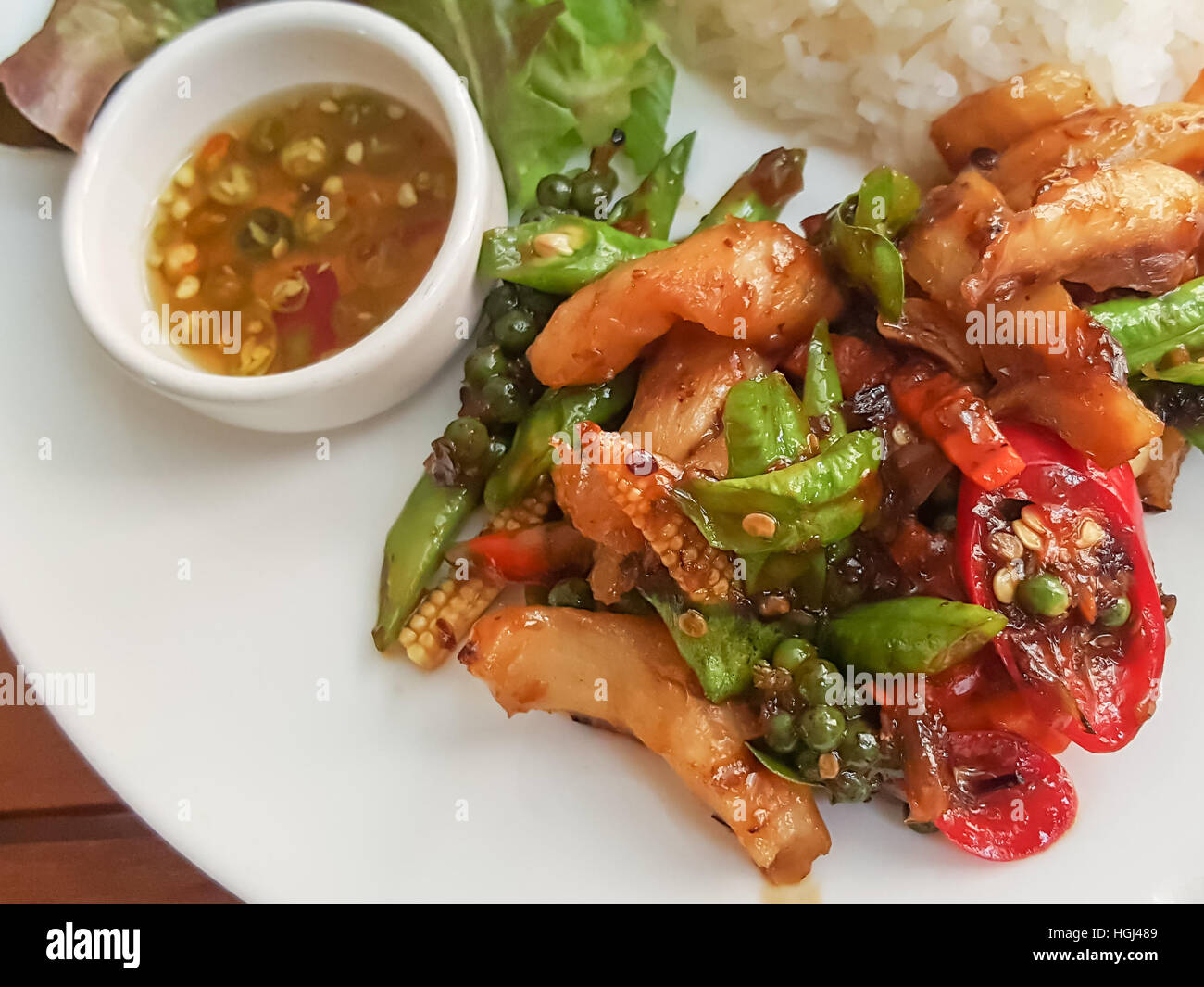Close-up:Fried Drunken Fish served with spicy sauce Stock Photo - Alamy