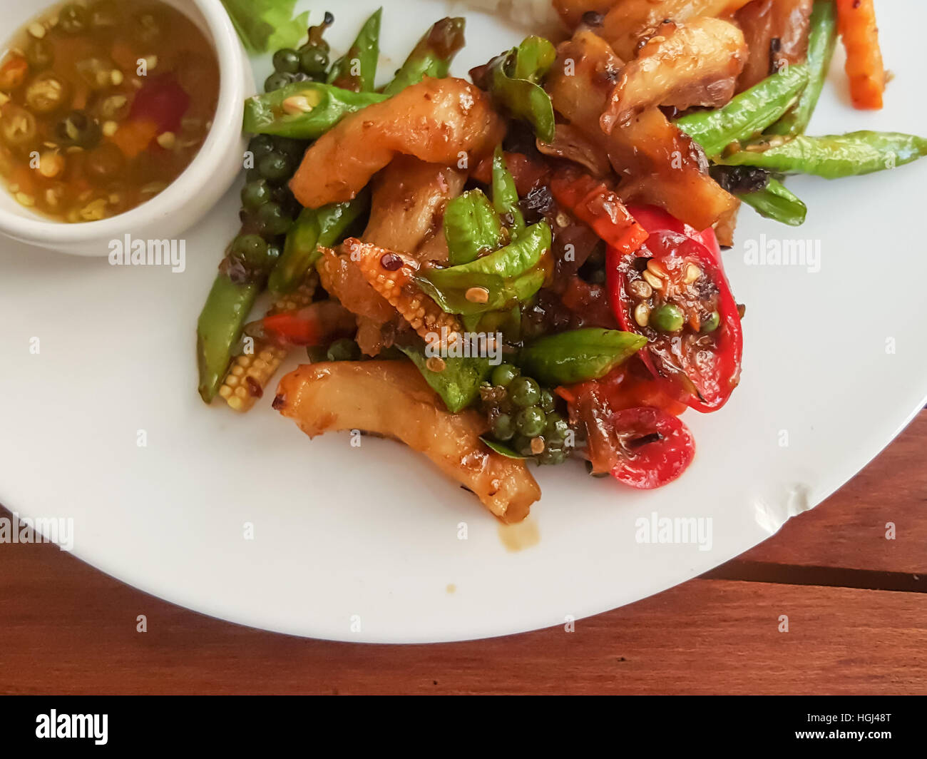 Close-up:Fried Drunken Fish served with spicy sauce Stock Photo - Alamy