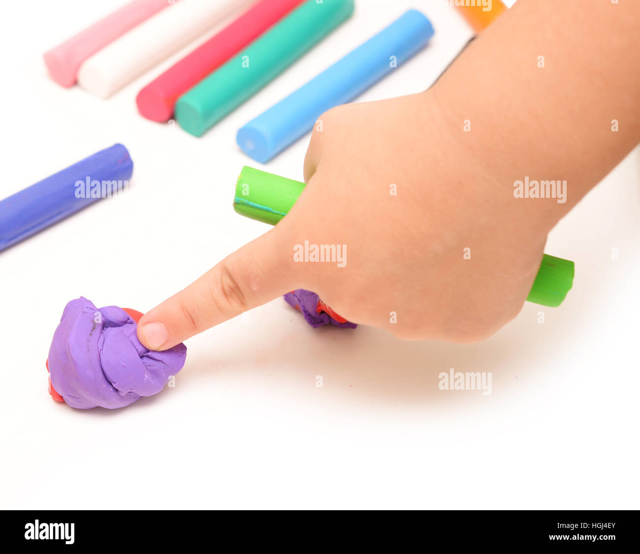 Child hands playing with colorful clay Stock Photo - Alamy