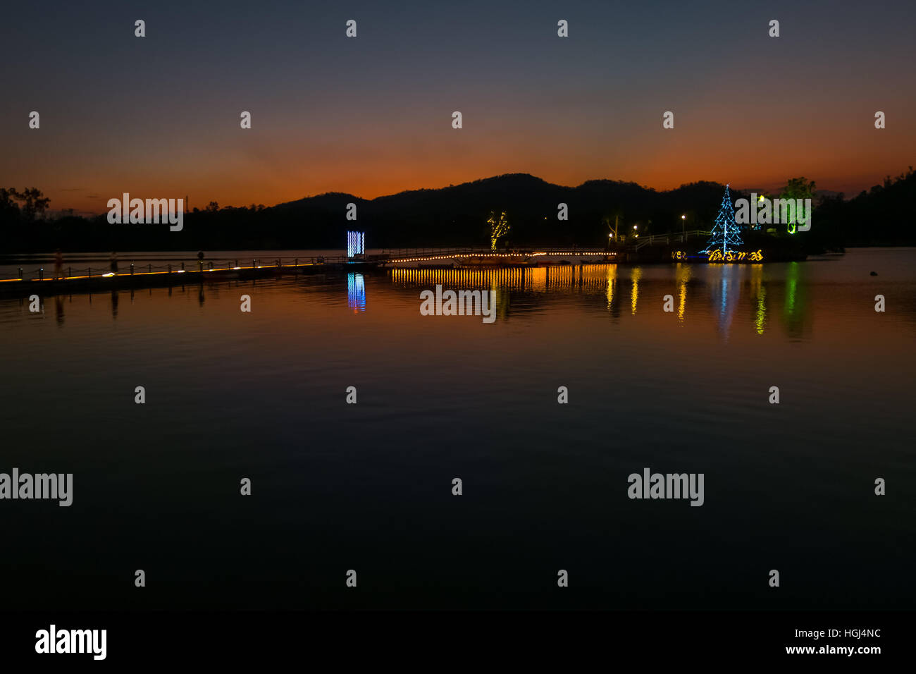 Colorfull sky after sunset over the lake in Thailand Stock Photo - Alamy