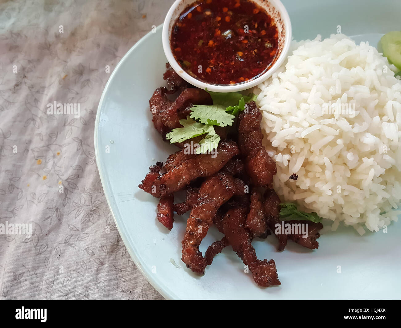 Thailand food style:"Kaow Moo Tod Nam Jim Jaw"Fried pork with rice ...
