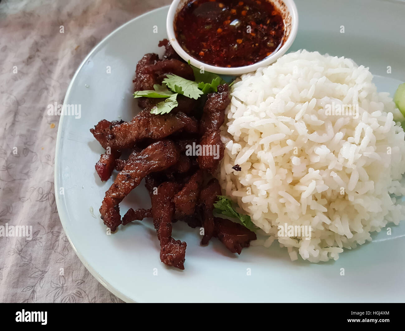 Thailand food style:"Kaow Moo Tod Nam Jim Jaw"Fried pork with rice ...