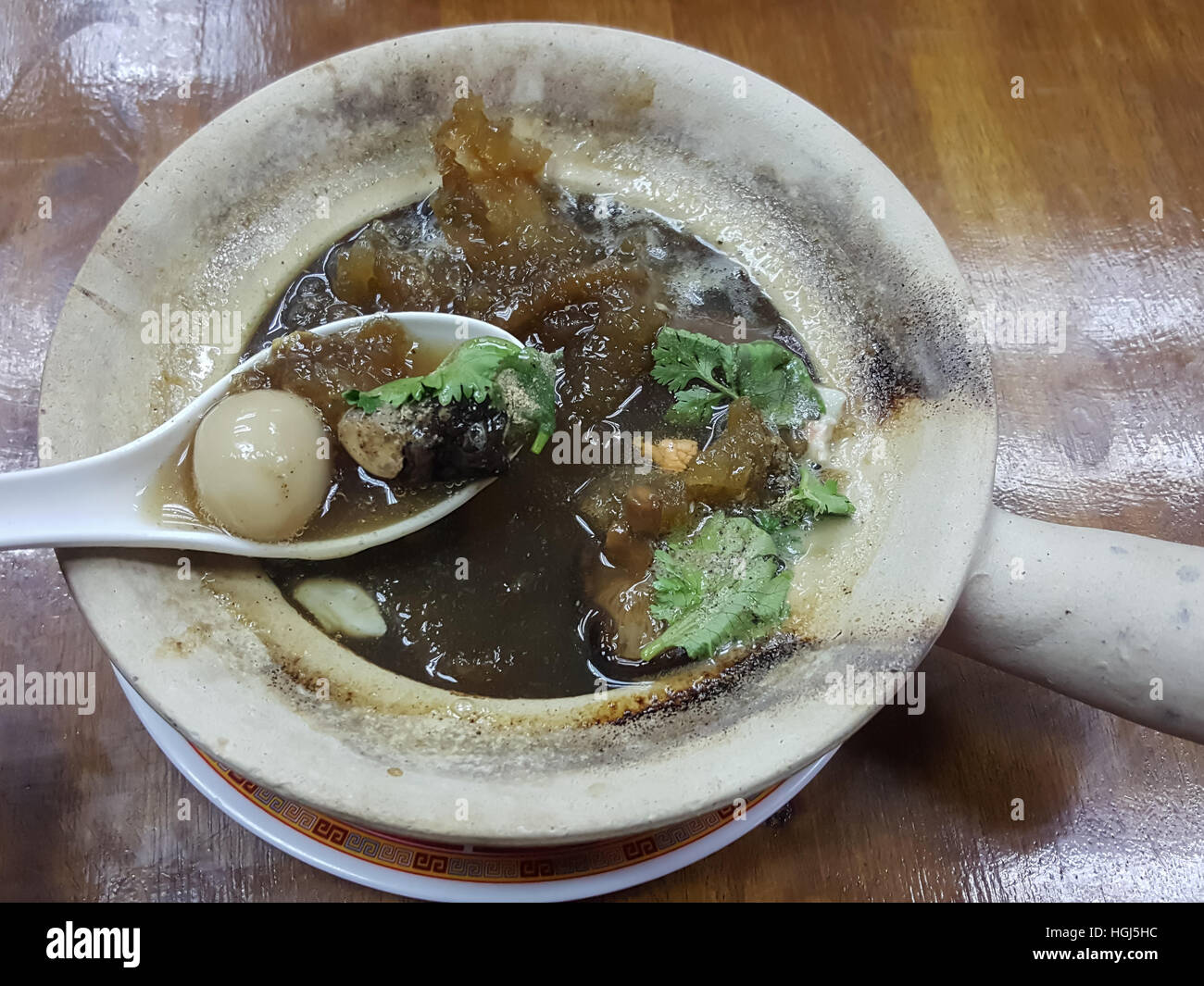 Braised Fish Maw with sauce for healthy served on pot Stock Photo - Alamy