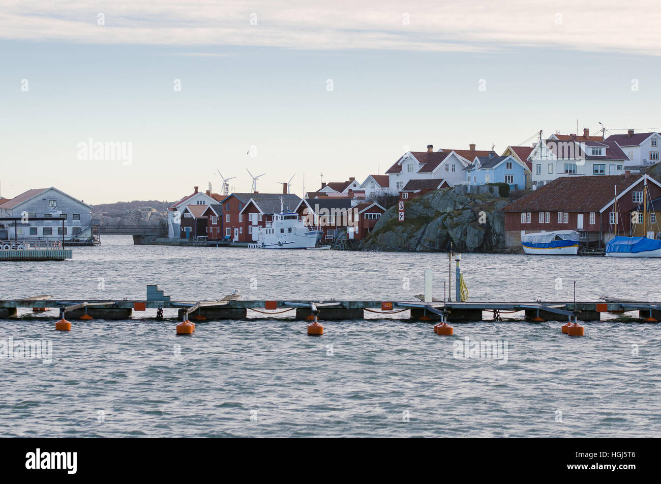 one harbour in sweden on the westcoast a fishingboat and many other ...