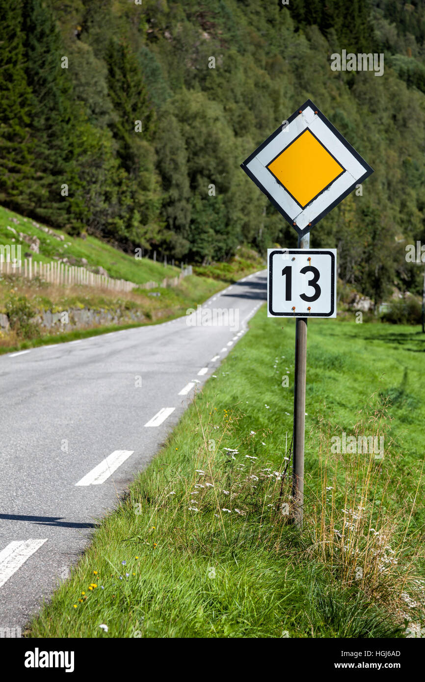 Rural asphalt road number 13 sign Stock Photo - Alamy
