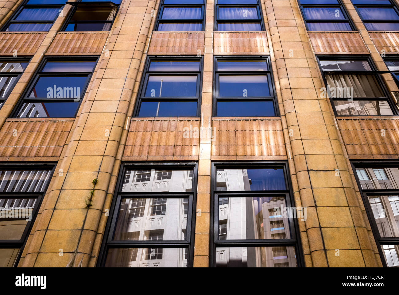 Windows of commercial building in New Zealand Stock Photo - Alamy