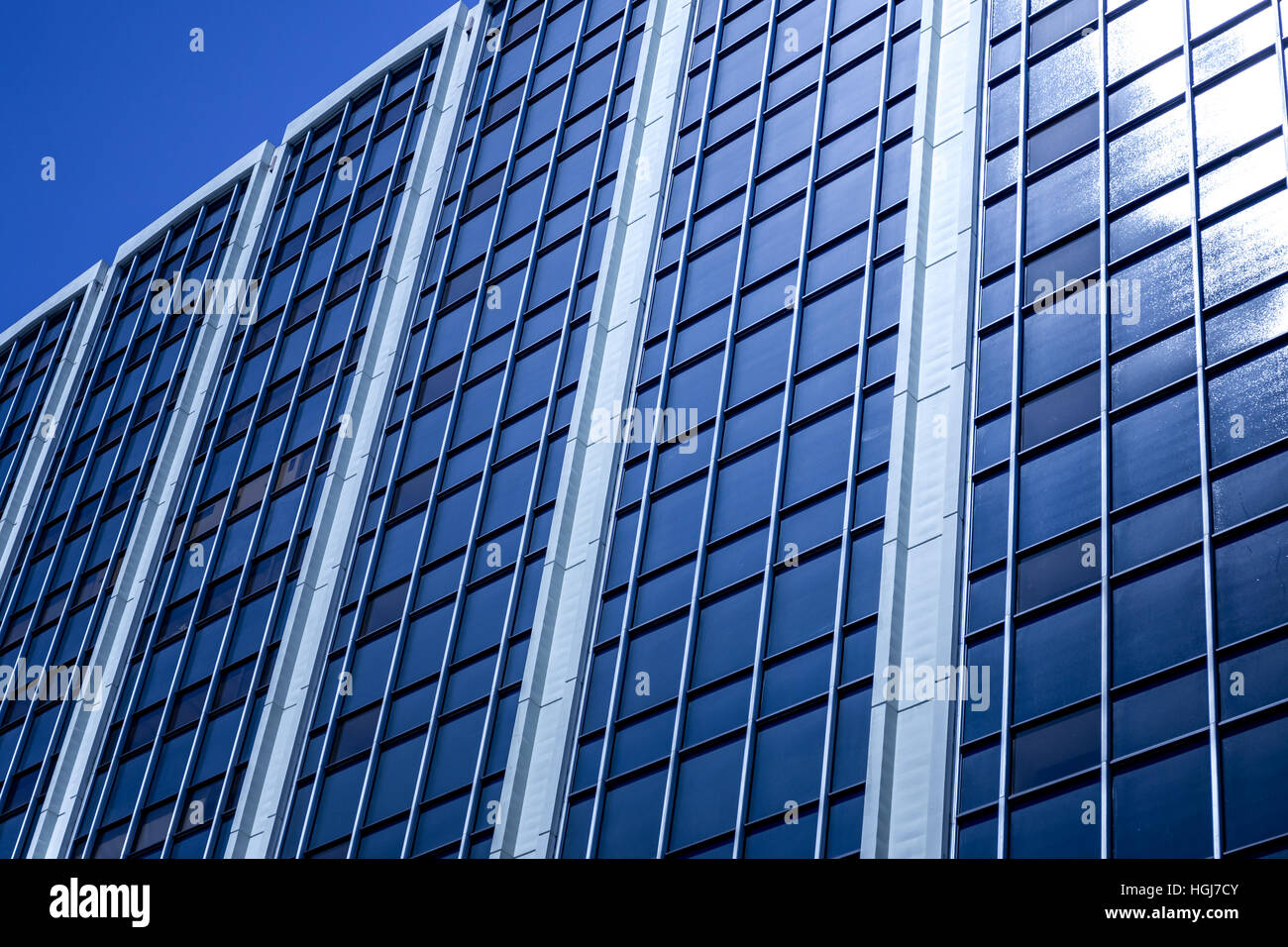 Windows of commercial building in New Zealand Stock Photo - Alamy
