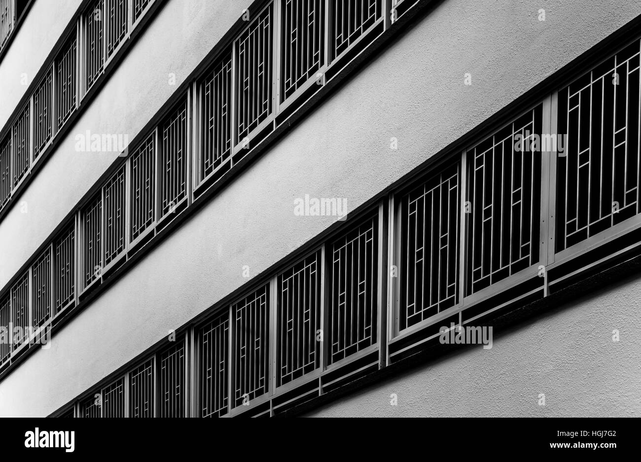 Windows of commercial building in Hong Kong with B&W color Stock Photo ...