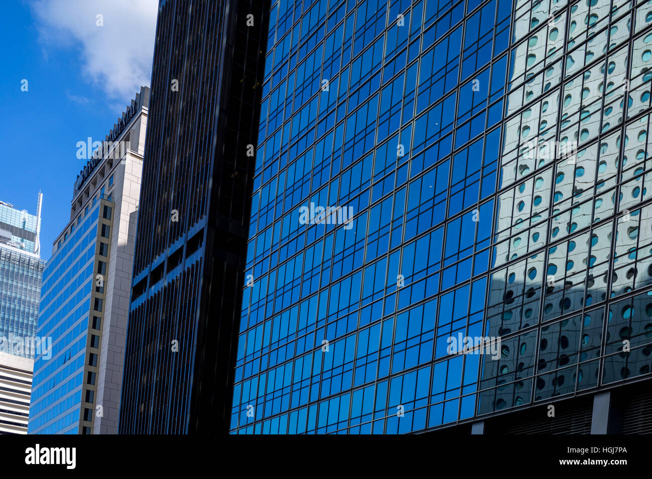 Windows of commercial building in Hong Kong Stock Photo - Alamy