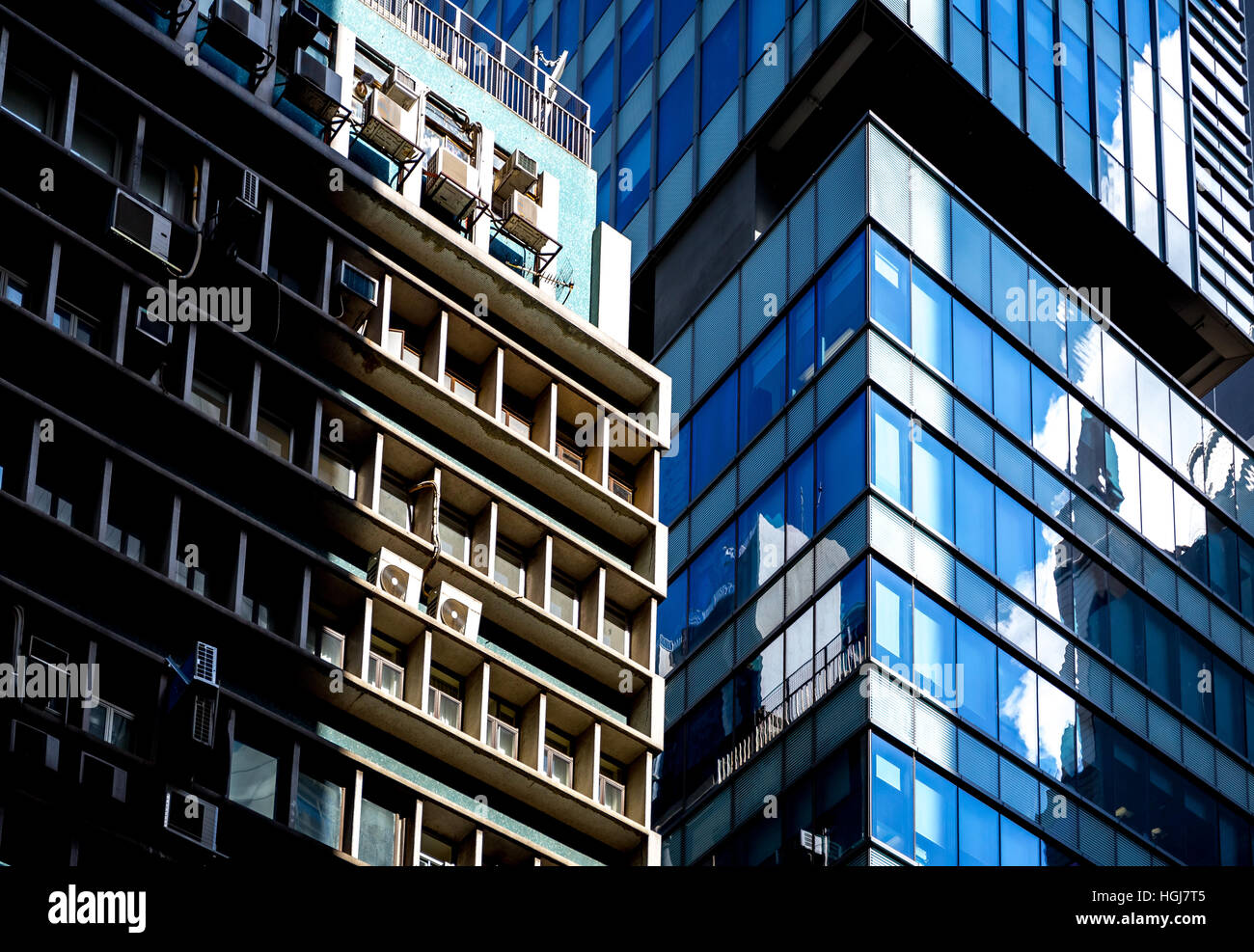 Windows of commercial building in Hong Kong Stock Photo - Alamy