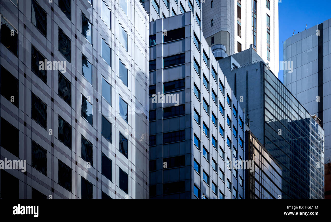 Windows of commercial building in Hong Kong Stock Photo - Alamy
