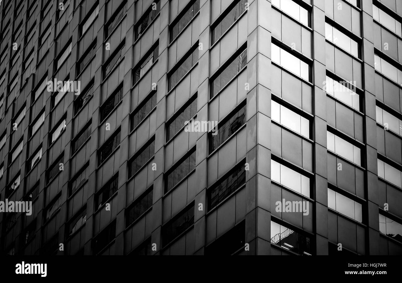 Windows of commercial building in Hong Kong with B&W color Stock Photo ...