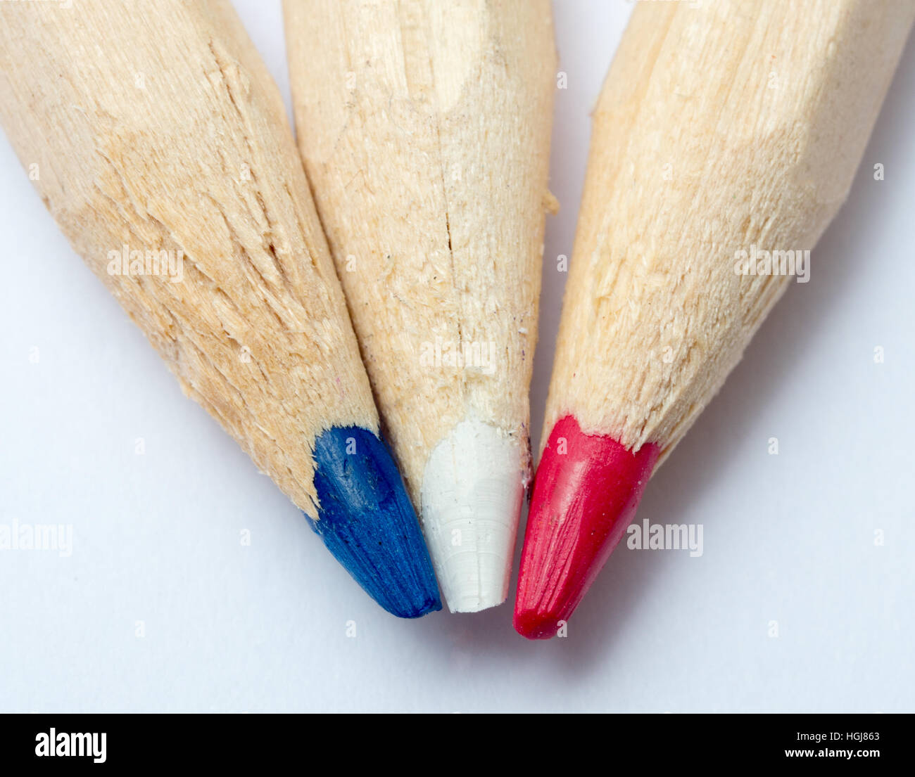 three colored pencils, blue, white, red Stock Photo - Alamy