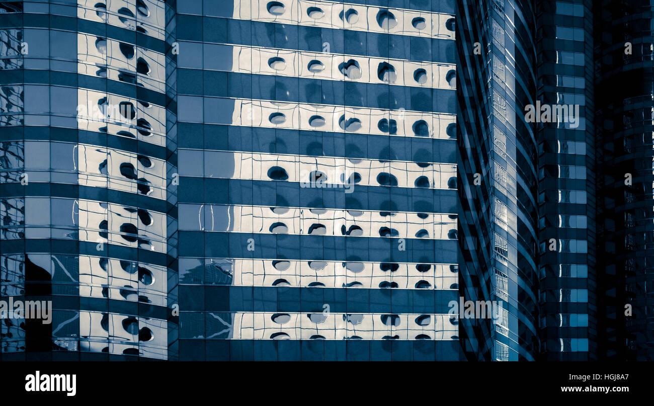 Windows of commercial building in Hong Kong Stock Photo - Alamy