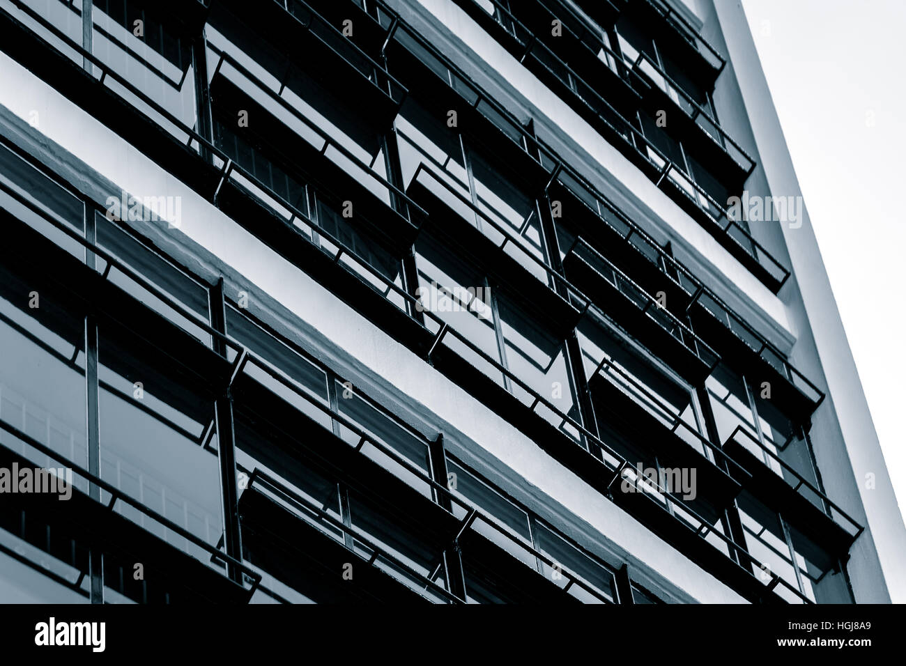 Windows of commercial building in Hong Kong Stock Photo - Alamy