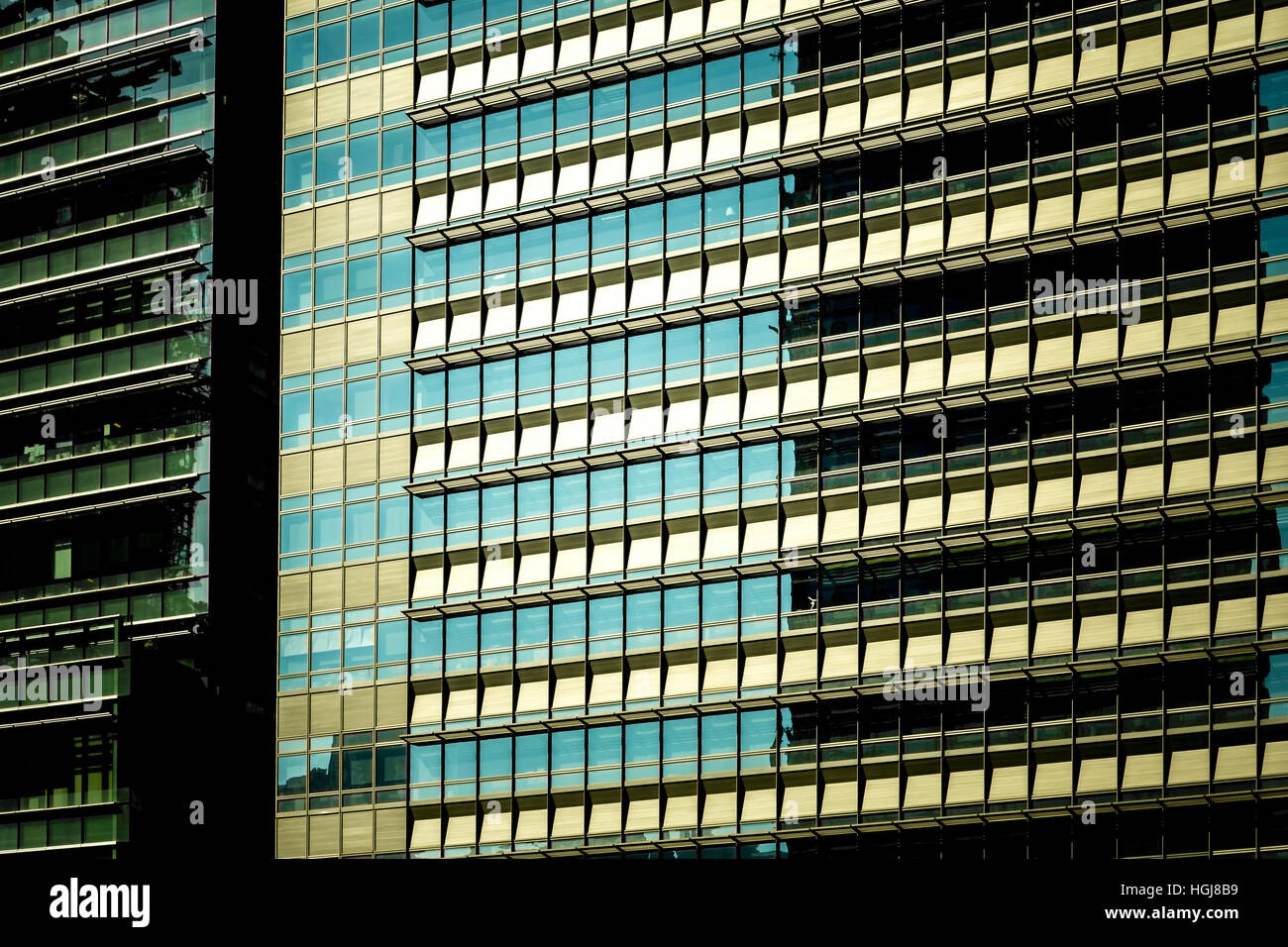 Windows of commercial building in Hong Kong Stock Photo - Alamy