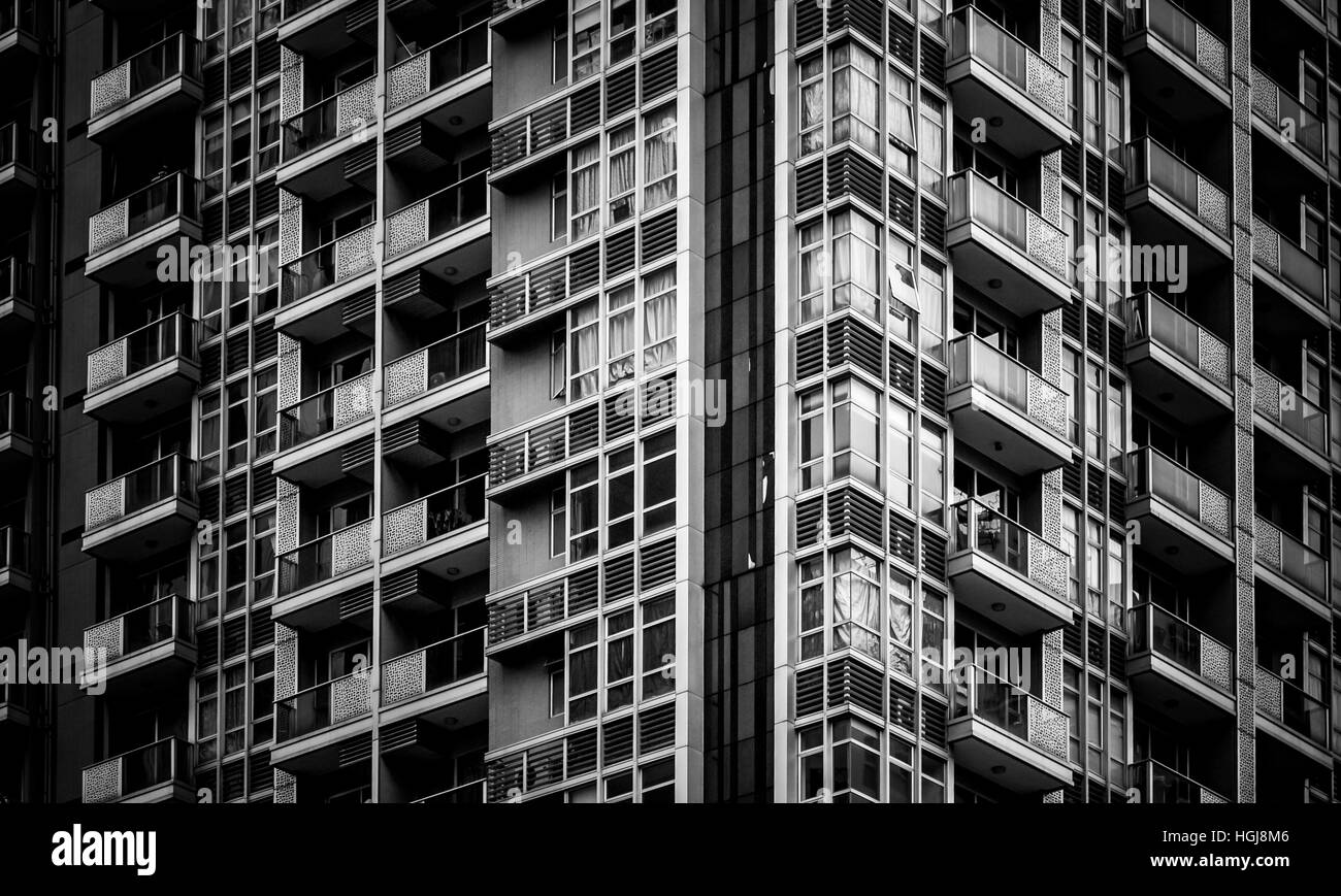 Windows of commercial building in Hong Kong with B&W color Stock Photo ...